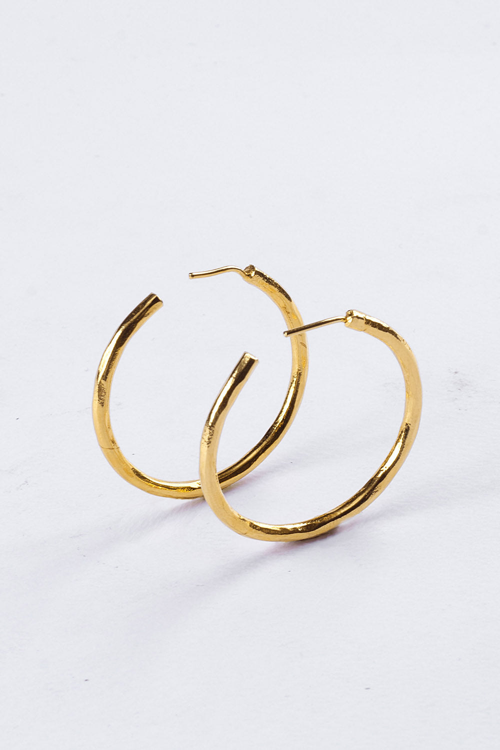 Hammered brass hoop earrings store